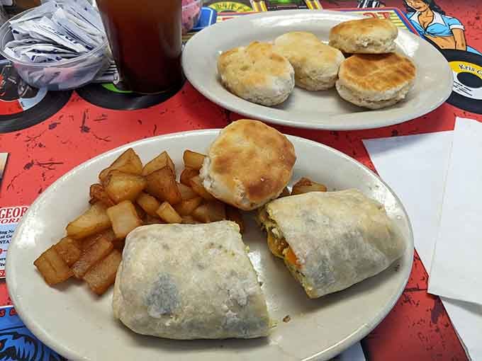 Breakfast burritos stuffed with home fries and fluffy biscuits on the side, because one carb is never enough here.