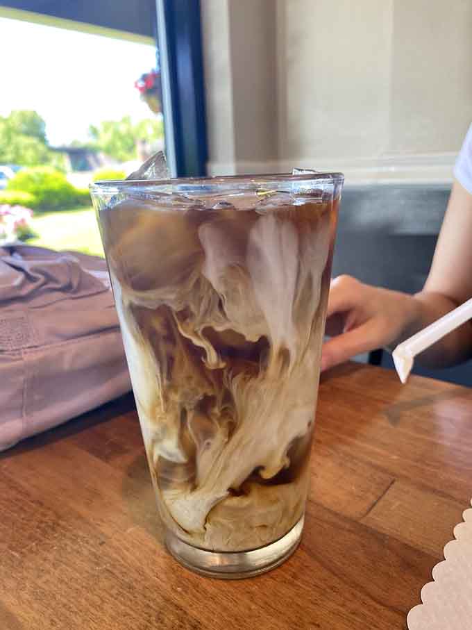 Iced coffee swirling like a caffeinated work of art, ready to jumpstart your morning into high gear.