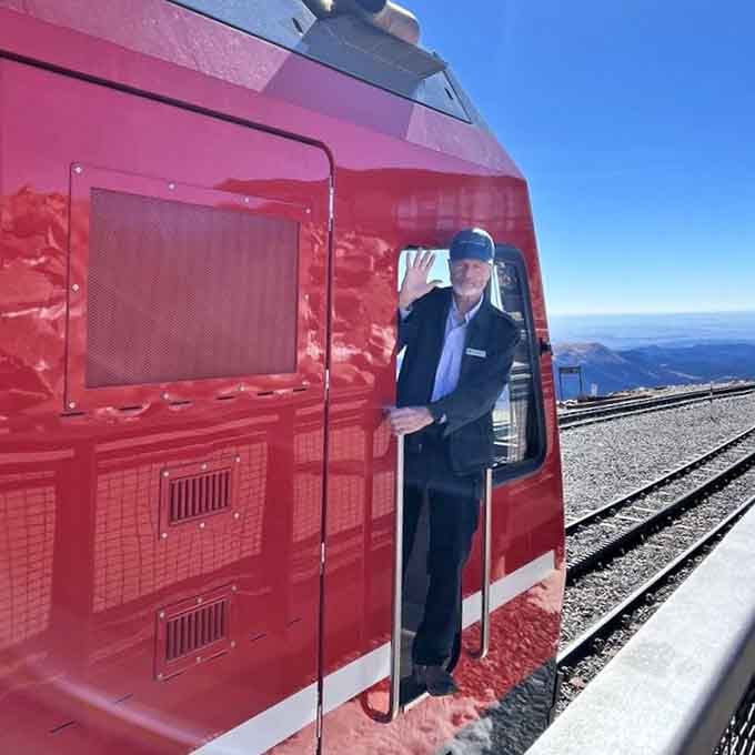 Your friendly conductor waves from the train, ready to share stories and facts without turning it into a boring lecture.