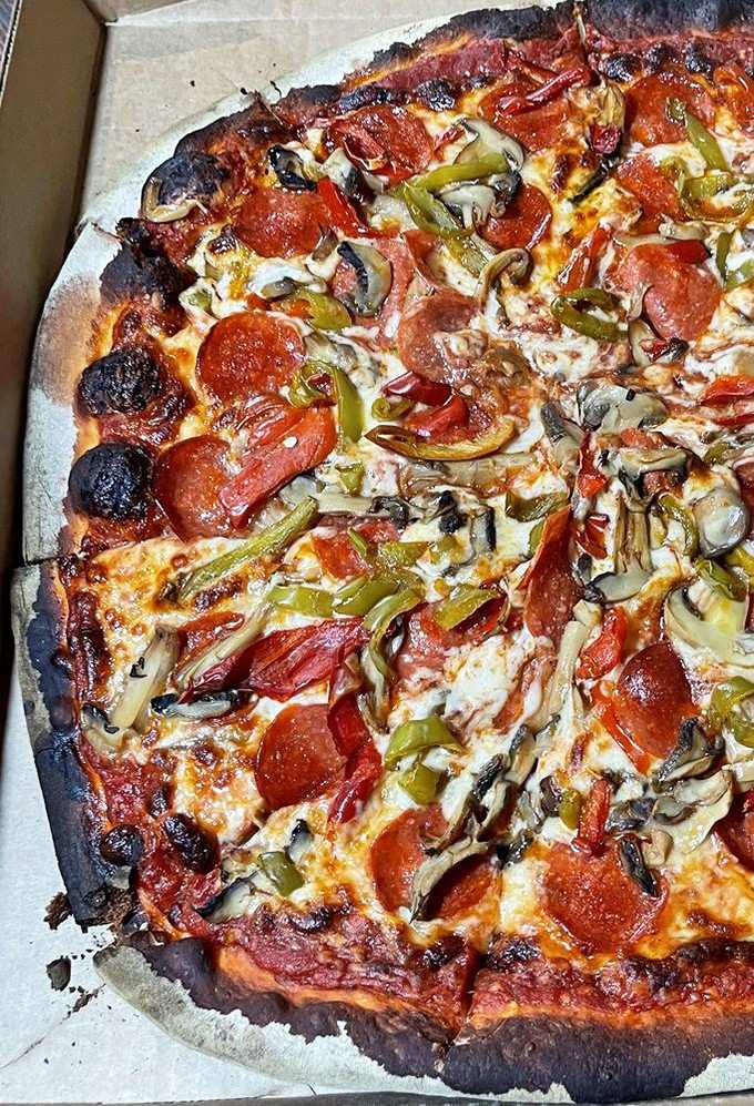When they call it a house special, they mean it, loaded with toppings that prove generosity never goes out of style.