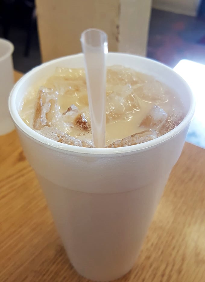 Ice-cold horchata in a foam cup is the perfect sweet, creamy companion to anything spicy on the menu.