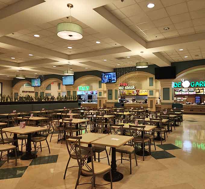 Food courts offering sustenance between shopping sprints, because bargain hunting burns serious calories and requires fuel.