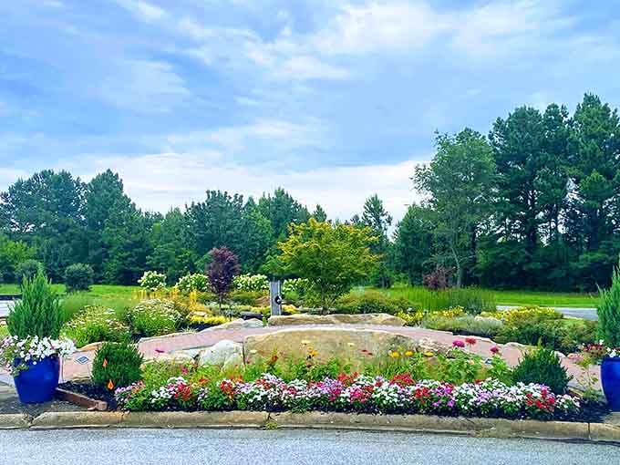 Colorful blooms frame the entrance like nature's way of welcoming visitors to mechanical marvels inside.