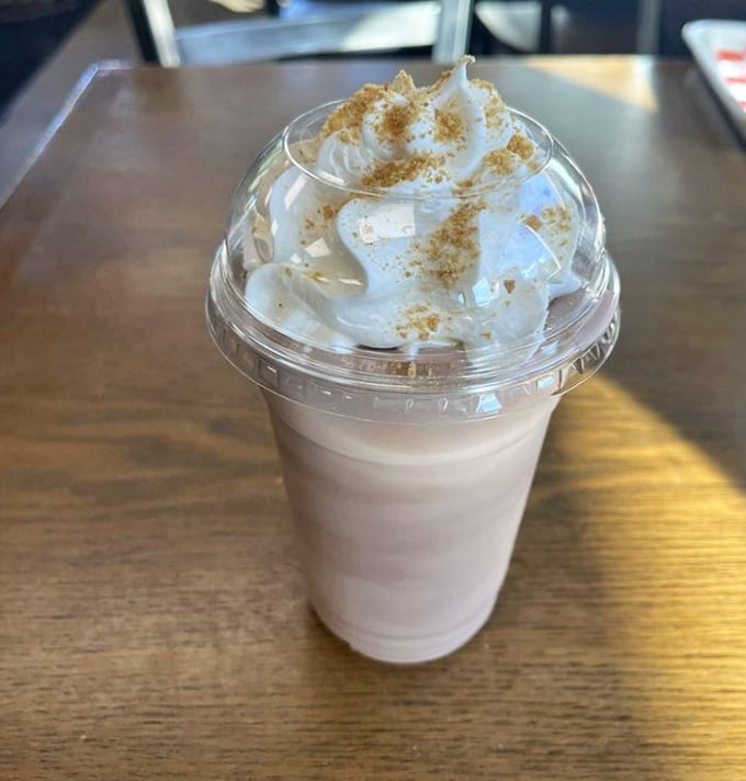 Whipped cream peaks dusted with cinnamon create a sweet finale that's almost too pretty to drink, almost.