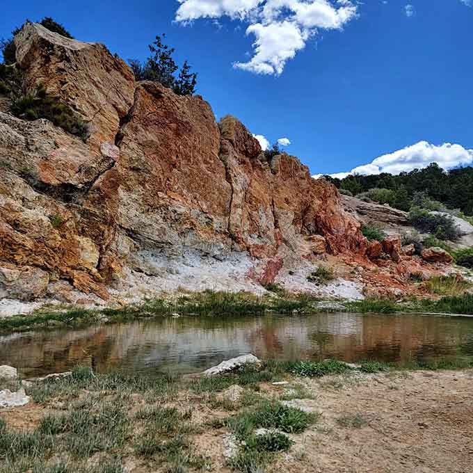 Those rust-red cliffs aren't just pretty. They're proof the earth has been cooking something spectacular down below.