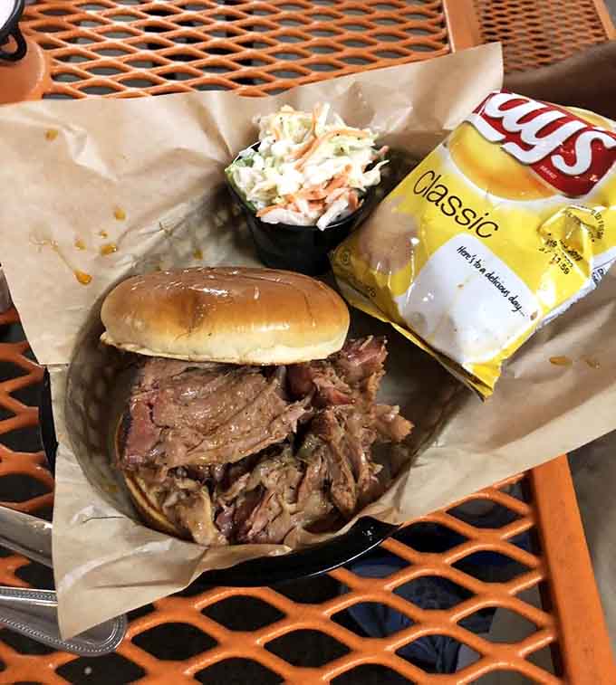 That pulled pork sandwich looks like it's about to change someone's entire afternoon plans for the better.