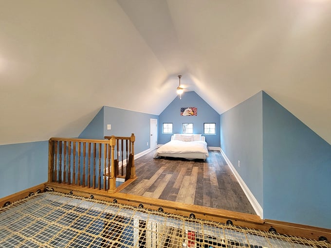The loft bedroom features netting that's either for safety or making you feel like a very pampered trapeze artist.