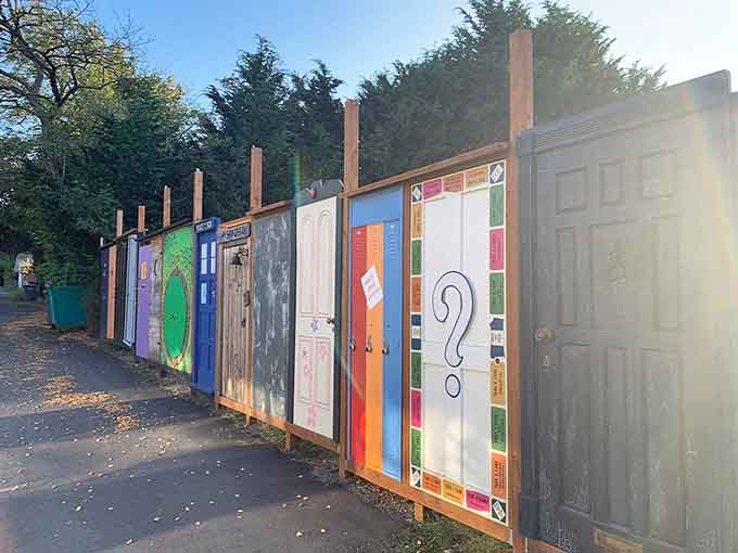 The famous door fence showcases island creativity, where even property boundaries become public art installations worth photographing.