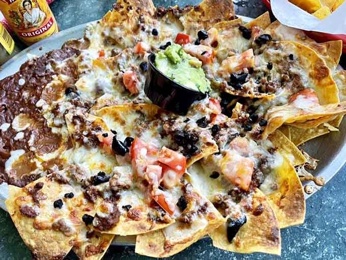 These aren't your average nachos, they're a fully loaded fiesta that could feed a small village or one very hungry person.