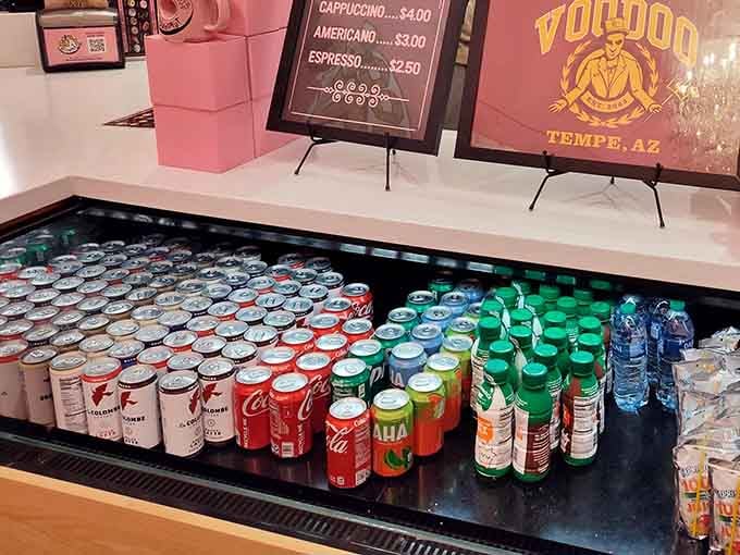 The beverage cooler stands ready to provide refreshment for those brave souls tackling multiple doughnuts in one sitting.