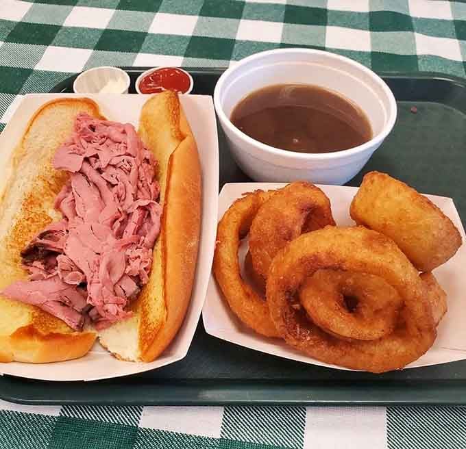 French dip sandwich meets golden onion rings in a partnership more successful than most Hollywood marriages.