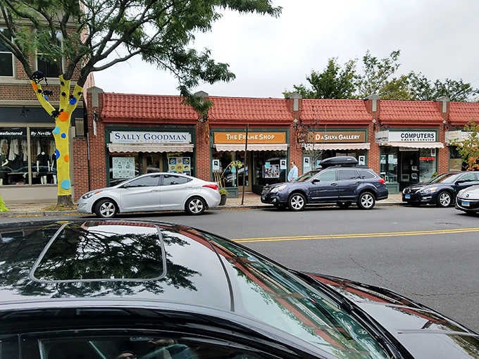 Local shops lining the street, each one offering something you didn't know you needed until right now.