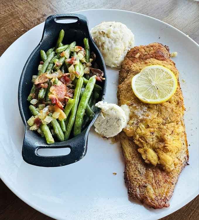 That perfectly seasoned grouper with green beans proves they're not playing favorites, every dish gets the royal treatment here.