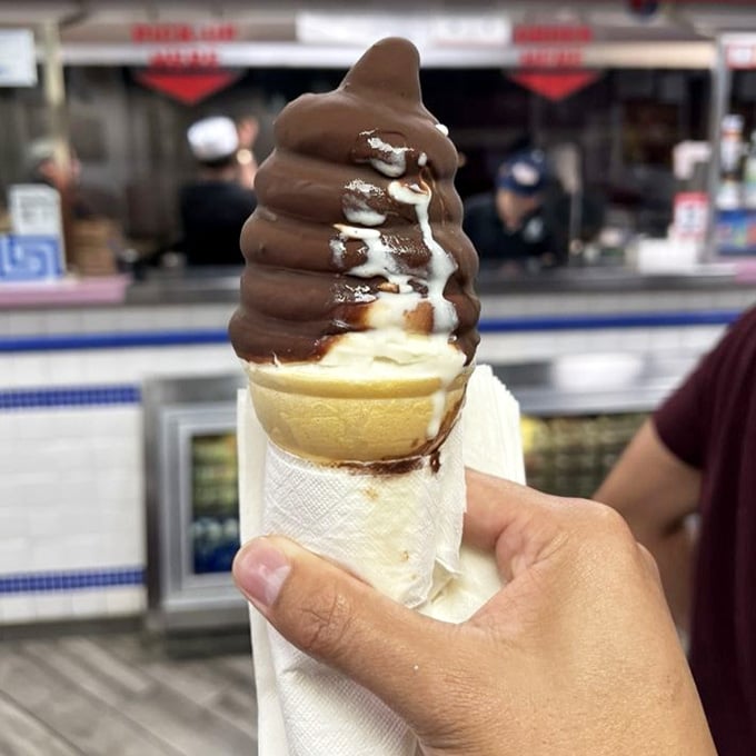 Soft serve with chocolate drizzle is the sweet ending your gyro-filled belly didn't know it needed but absolutely deserves.