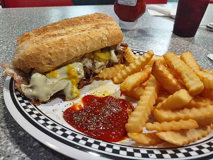 This loaded sandwich on a hoagie roll with waffle fries proves that lunch at Woody's means business, delicious business.