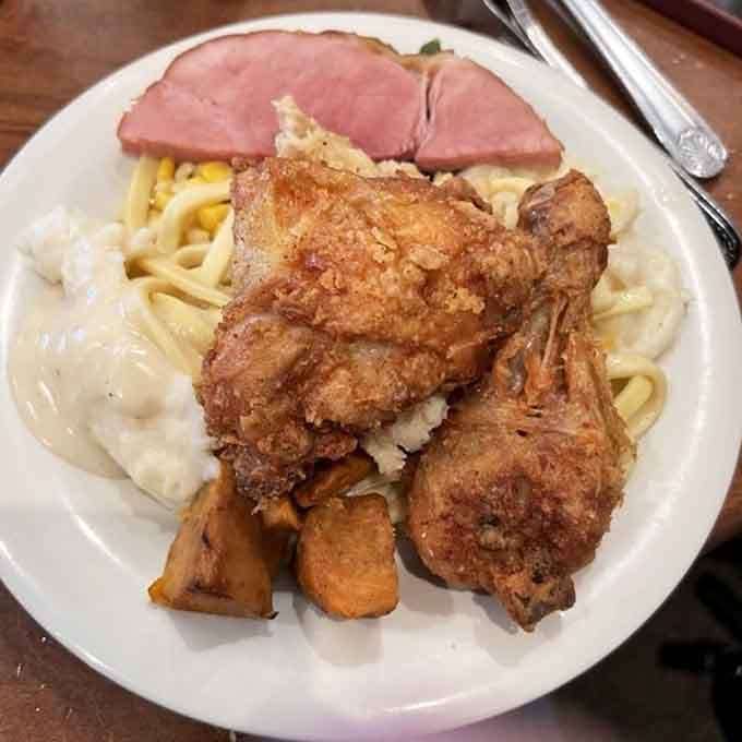 Fried chicken, ham, noodles, and mashed potatoes prove that sometimes more really is more, especially when it's this good.
