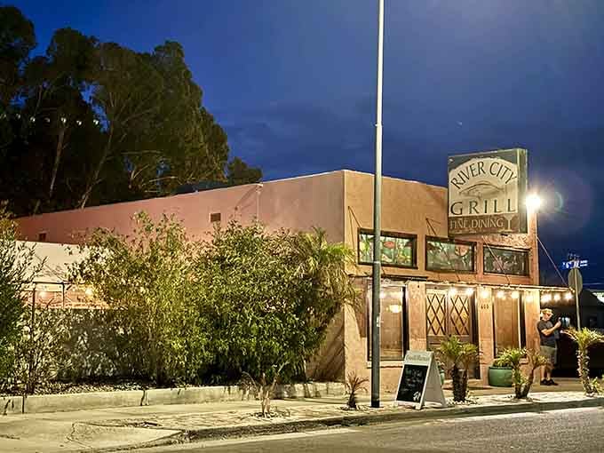 River City Grill's adobe exterior promises fine dining with views that make every meal feel like a celebration.