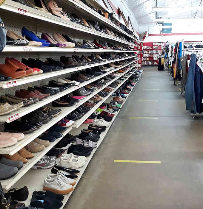 An entire wall dedicated to footwear presents options from sneakers to heels, all waiting for their second act.