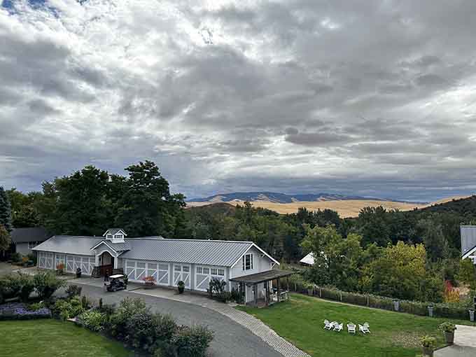 Dramatic clouds roll over the farmhouse-style winery, creating moody skies that photographers dream about capturing on film here.