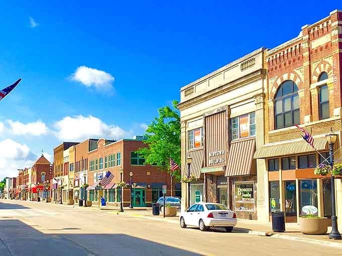 Pristine downtown architecture gleams under blue skies, each building restored with the care of people who remember when.