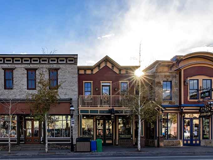 Sunset catches Breckenridge's Victorian buildings in warm light, turning an ordinary evening stroll into something genuinely magical.