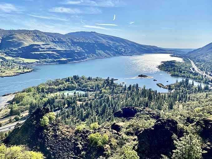 The Columbia River winds through this gorge like a silver ribbon connecting mountains that tower on both sides.