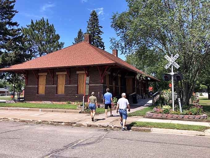 Three generations strolling toward the old depot&mdash;this is what peaceful Sunday afternoons were meant to look like.