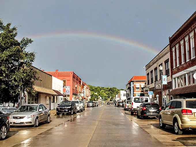 After the storm comes the rainbow, arching over downtown like nature's way of saying this place is blessed.