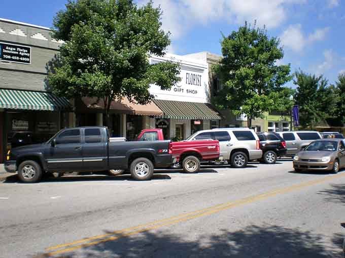 Notice how the florist shop anchors this block, proving small-town commerce thrives when communities support their own.