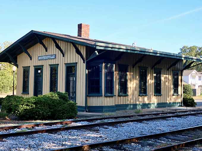 The cheerful yellow depot with its classic overhanging eaves welcomes visitors just like it did generations of train travelers.