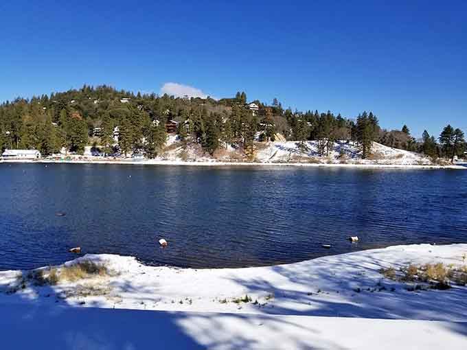 Winter transforms this mountain lake into a snow-globe scene that Norman Rockwell would have painted with joy.