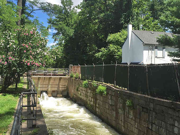 The canal lock system still functions like clockwork, a testament to engineering that's stood the test of time.
