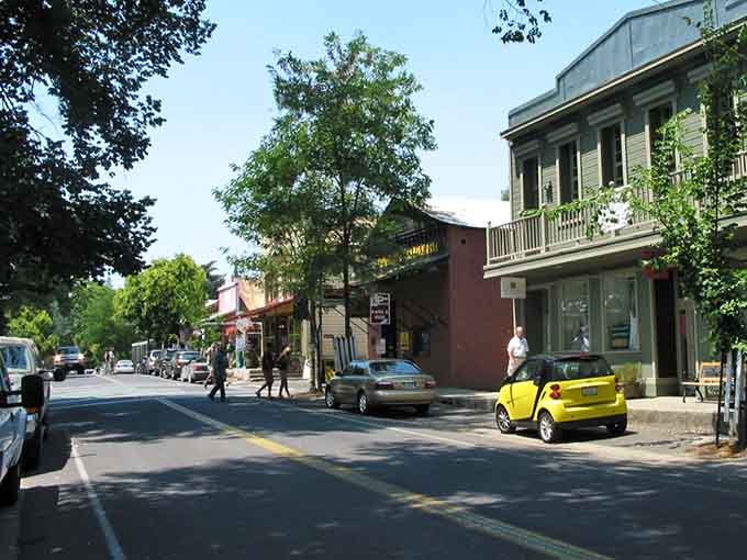 Victorian balconies and bright yellow cars add character to streets where history meets modern life without breaking a sweat.