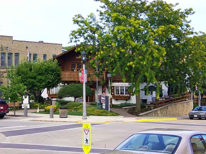 New Glarus brings authentic Swiss charm to Wisconsin with its distinctive Alpine architecture and welcoming downtown atmosphere that delights visitors year-round.