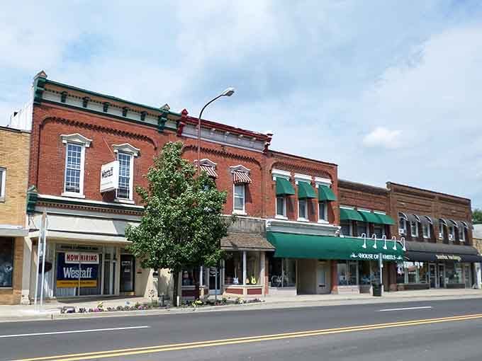 Owosso's classic Main Street architecture features awnings and details that remind you when craftsmanship actually mattered in construction.