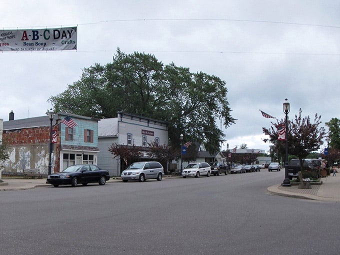 Port Hope's small-town main street embodies quiet simplicity, where community festivals bring neighbors together under wide open skies.