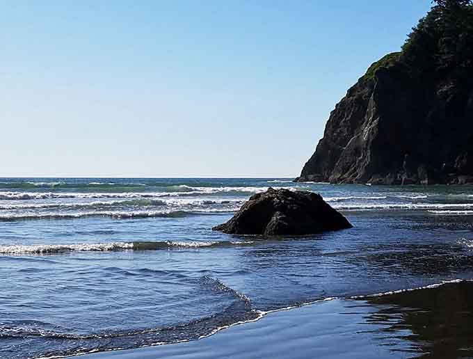 Ruby Beach spreads its treasures of driftwood and tide pools beneath towering coastal headlands.