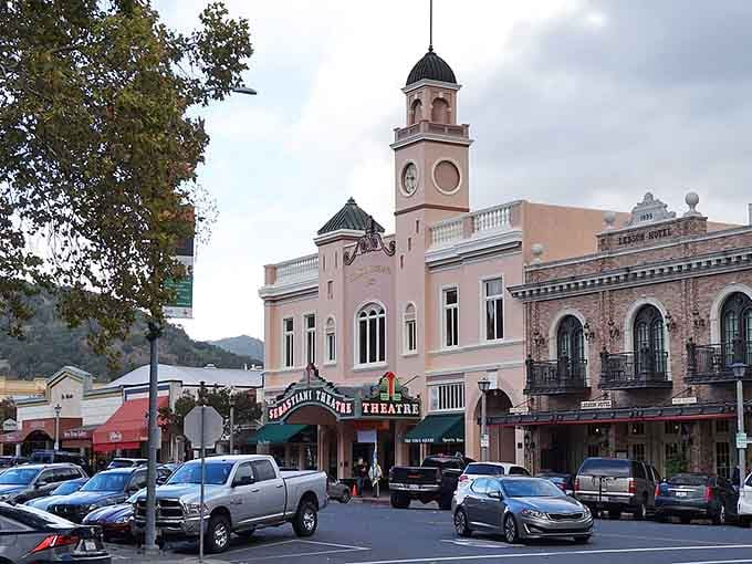 That pink clock tower stands like a Spanish colonial jewel, anchoring a downtown that takes its architectural heritage seriously.