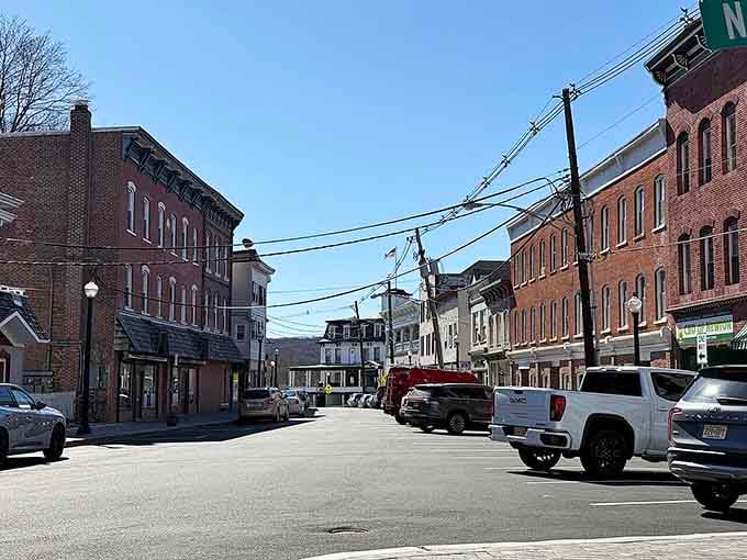 Historic brick buildings line streets where parking is easy and the hardest choice is picking which restaurant to try first.