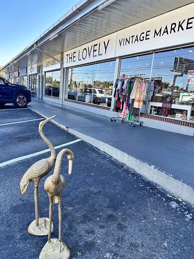 Those golden flamingo statues standing guard outside signal you're entering a vintage wonderland where quirky treasures await discovery.