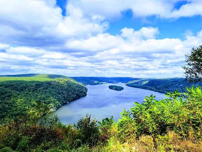 The lake stretches between rolling hills under dramatic clouds, offering views that rival anything you'd find out west.
