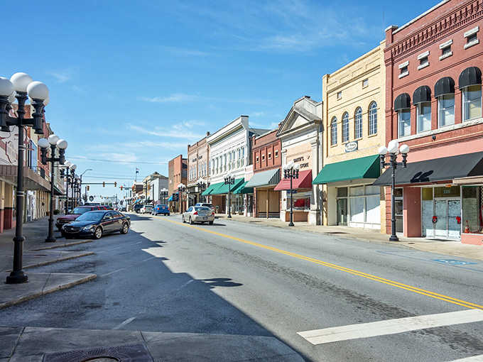 Pastel buildings line up like old friends, each one offering its own slice of small-town shopping charm.