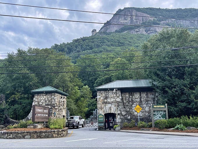 Stone entrance gates standing guard at the base of dramatic cliffs&mdash;this scenic byway means serious business about beauty.