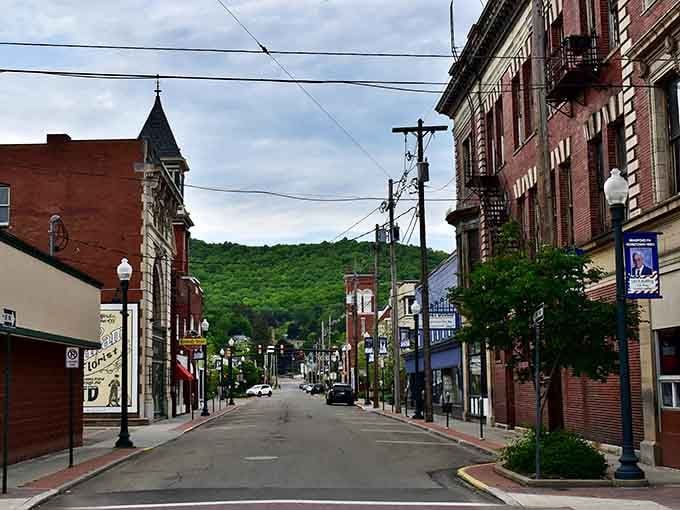Mountains rise behind historic buildings, creating a backdrop that reminds you why people settled in this beautiful valley.