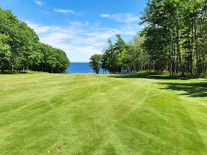 This pristine golf course fairway leads straight to the sparkling Atlantic like a green carpet.