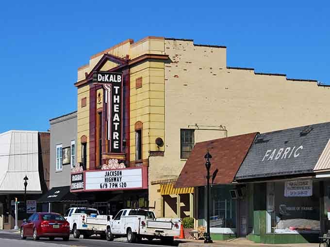The DeKalb Theatre's vertical sign rises proudly, reminding everyone that small towns still appreciate the magic of movies.