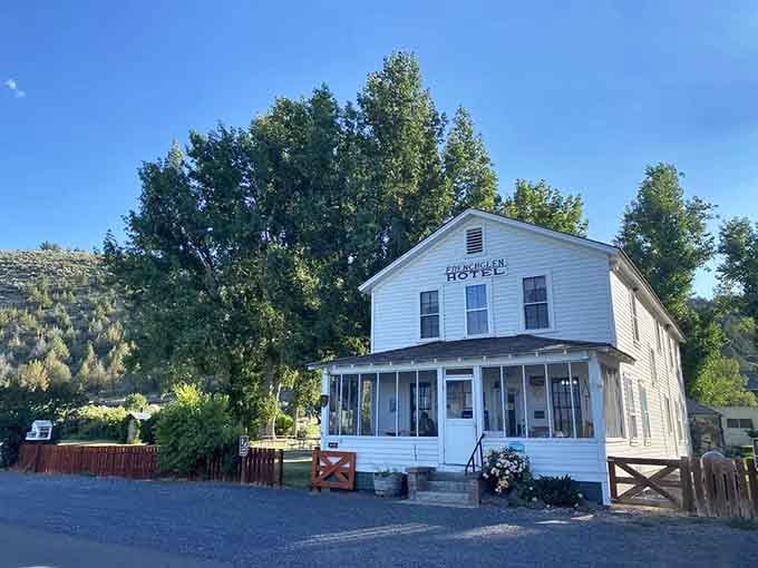 Tall trees shade this frontier hotel where travelers still find welcome at the edge of Oregon's outback.