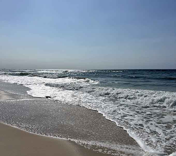 Gentle waves roll onto pristine sand in a rhythm that's been lulling beachgoers to relaxation since forever.