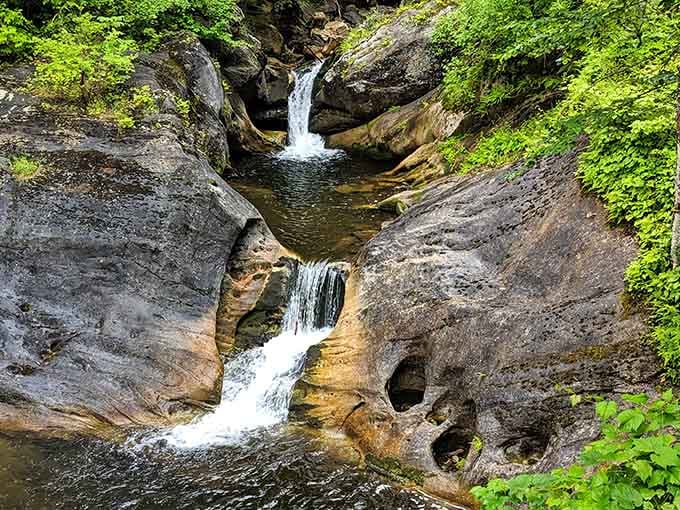 Water whispers through stone hollows, each splash carrying centuries of quiet stories while polishing every curve.