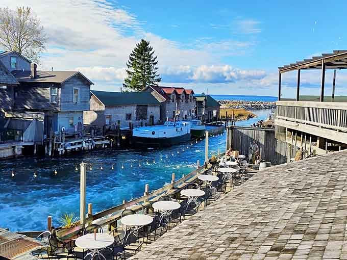 Cobblestone walkways lead past waterside dining where the lake provides entertainment better than any television show.